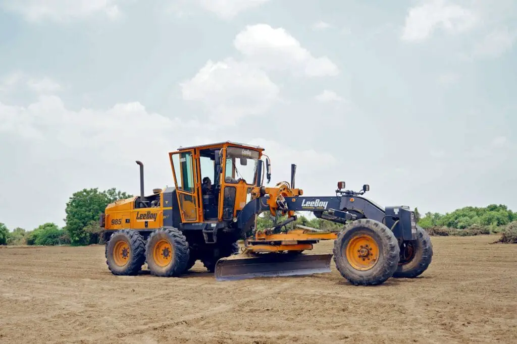 What Does A Motor Grader Do: Essential Roadwork Roles
